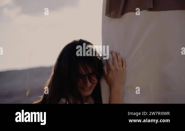 Mary mourns the death of Jesus at his feet. Jesus is crucified on the cross Stock Video Footage ...