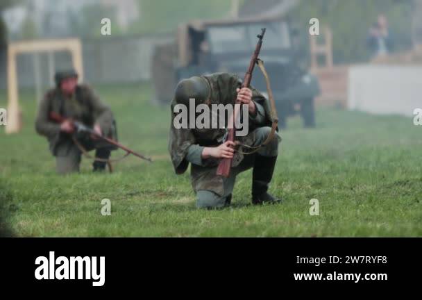 German soldiers rifle jammed during battle, faulty gun. Kraut hits butt ...