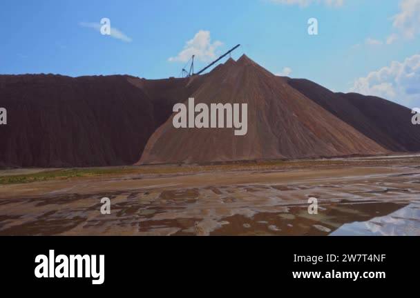 Mining industry close up. Telestacker handles the ore for potash waste ...