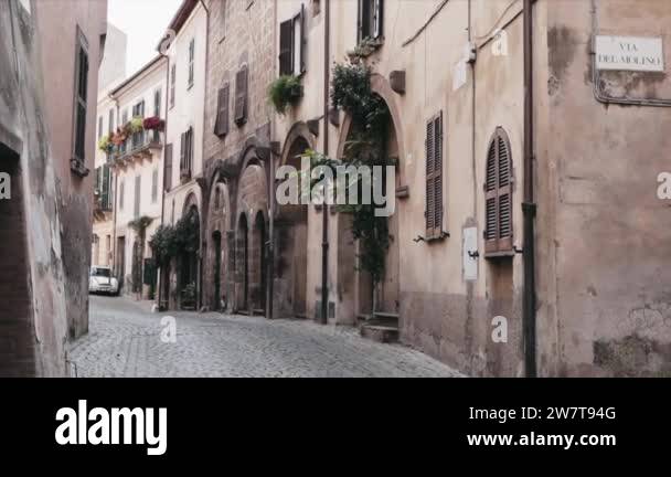 Majestic atmospheric mood on narrow streets of ancient Italian city ...