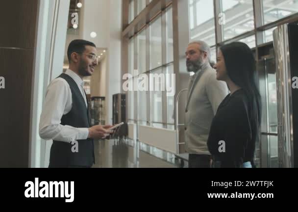 Hotel reception concierge in uniform Stock Videos & Footage - HD and 4K ...