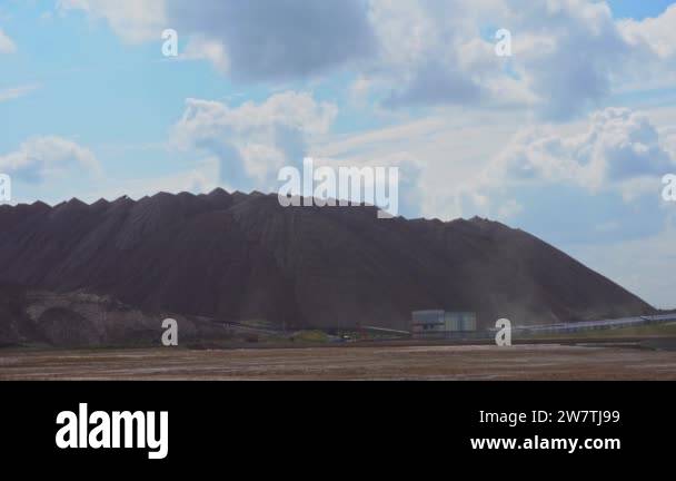 Mining industry with dust. Terricons and potash waste heaps, extraction ...