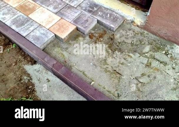 Paving slabs close-up. Laying Paving block stone Stock Video Footage ...