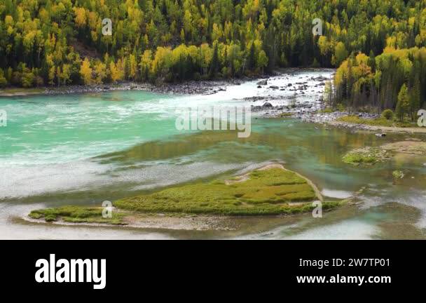 Moon Bay of Kanas Lake. The curved river with crystal blue water. Green ...