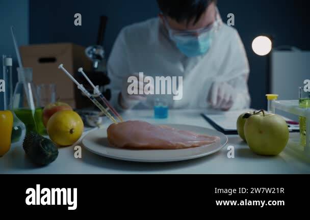 Bioengineering concept. Meat, vegetables and fruits are genetically ...