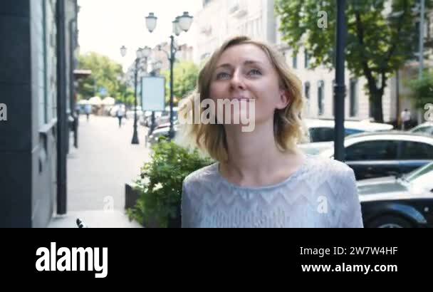 Woman wearing face mask, observing new normal social distancing measure ...