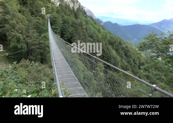 Metal suspension bridge in Valli del Pasubio in northern Italy in ...