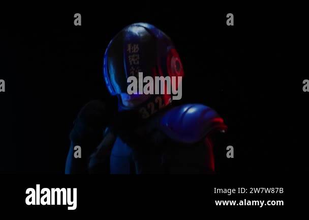 Cyberpunk future concept. Police officer stands in boxing pose and ...