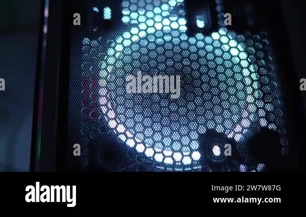Blue illumination of the fan in the pc case. Blue blades spin to cool ...