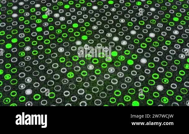 Rotating surface of green and white blinking circles on a dark grey ...