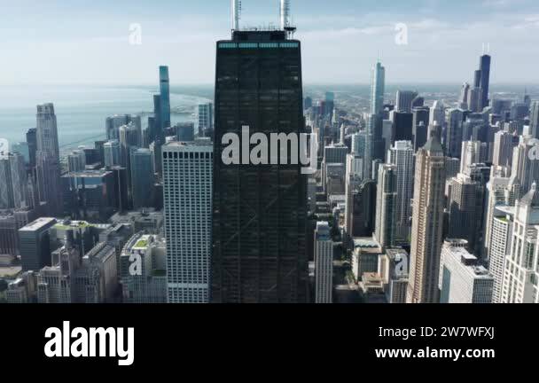 4K aerial TV and radio antennas on the John Hancock Center black tower ...