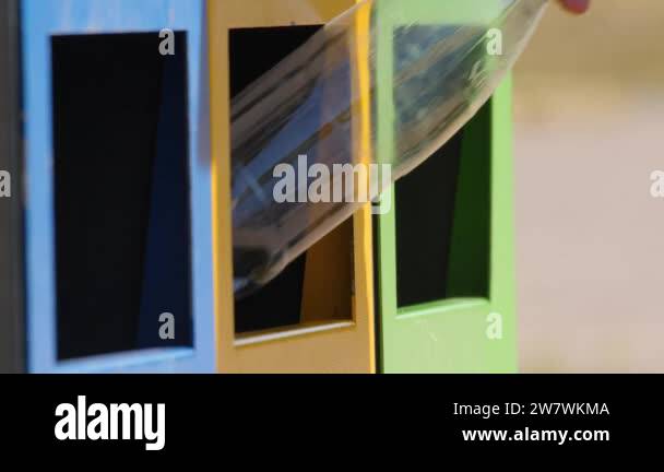 Hand man put bottle plastic trash can. Reduce waste recycle bins ...