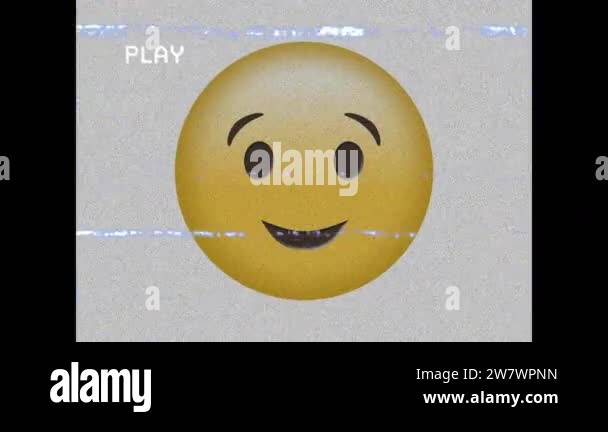 Digital animation of vhs glitch effect against winking face emoji on ...