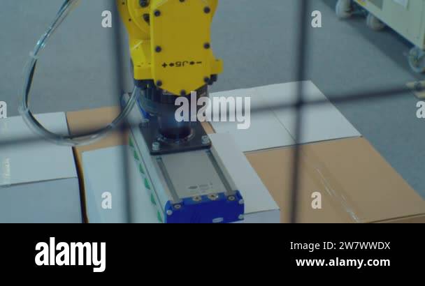 modern technology.Hand lines on the packaging conveyor. Robot ...