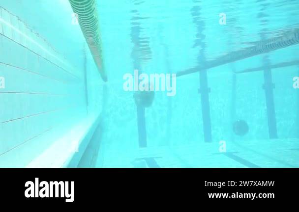 Underwater shooting of a swimmer in motion in a swimming pool Stock ...