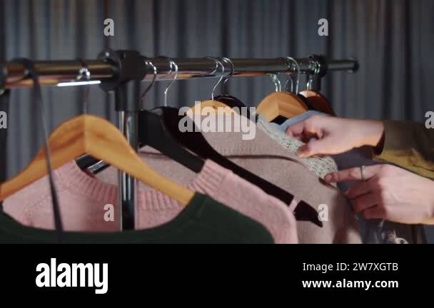 Woman looks on clothes Stock Videos & Footage - HD and 4K Video Clips ...
