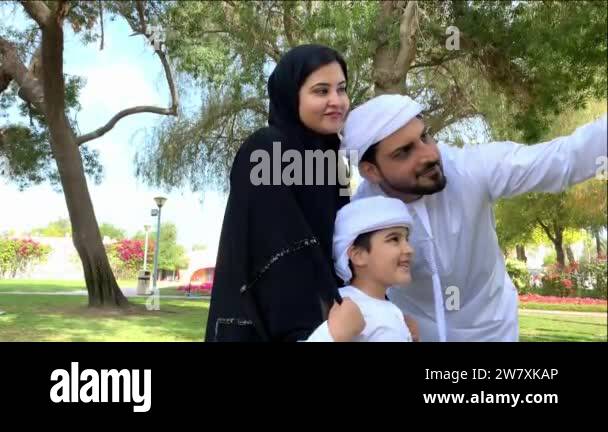 Arab Emirati Father doing selfie for this family wearing Kandura and ...