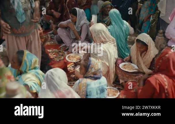 Karachi, Pakistan - September 2021. Poor Pakistani women and girls in ...