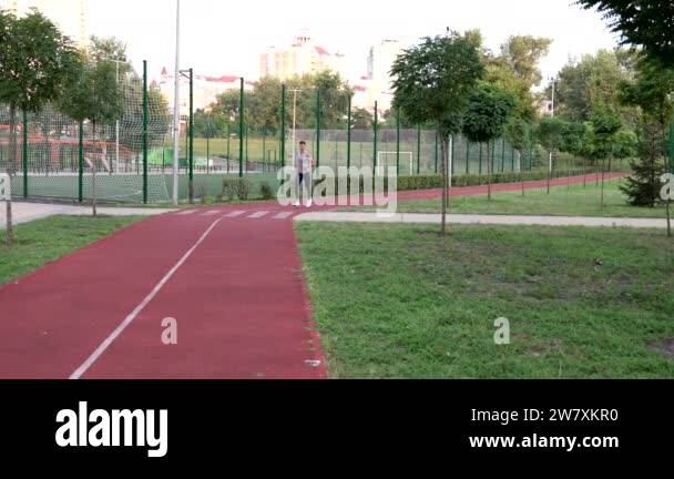 fit body sportsman sprinting in the park, sprinter Stock Video Footage ...