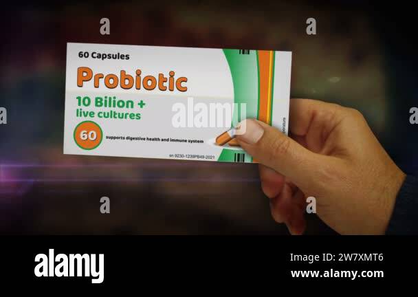 Probiotic box in hand. Medical infection therapy drug tablets pack ...