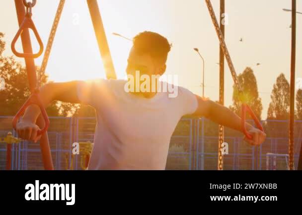 Happy millennial Middle Eastern Indian athletic guy training on ...