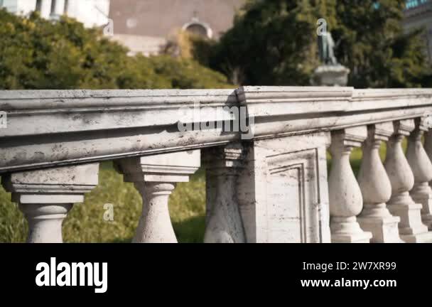 Antique Roman stairs with marble hand railing leading to the Capitoline Hill in the downtown of ...