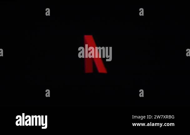 Netflix Intro Logo Animation displayed on old vintage CRT cathode ray tube TV screen with ...