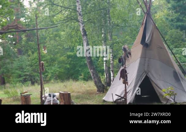 Forest home of the Indians. Wigwam indian teepee. The life of nomadic ...