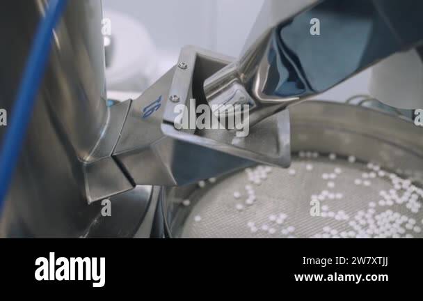 spinning tablets on pharmaceutical conveyor factory Spbd. test ...
