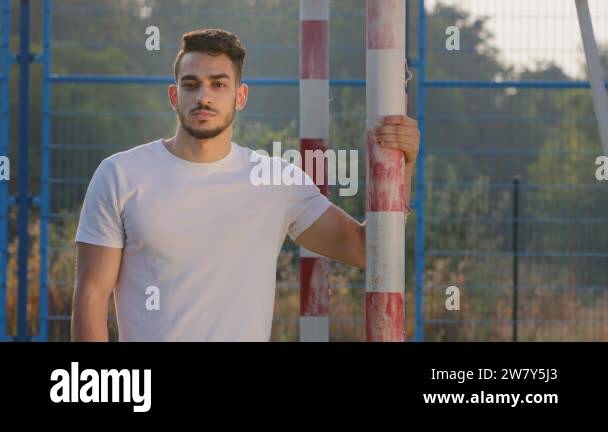 Young serious sportsman coach, goalkeeper or footballer in summer ...