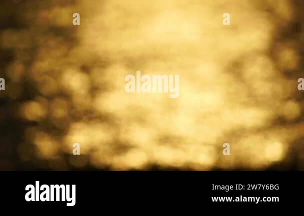 Bokeh sun glare reflection of Sunset sunrise light in water surface ...