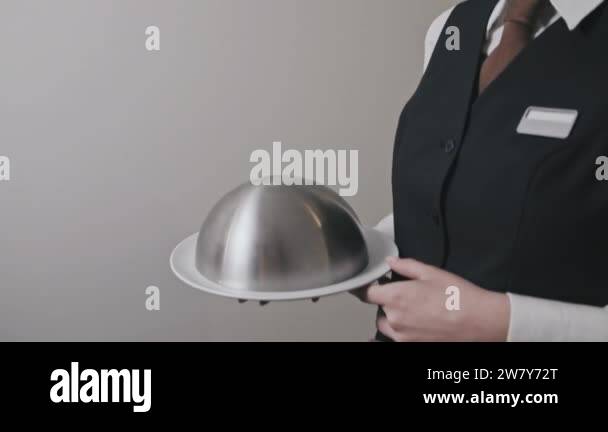 Holding metal tray Stock Videos & Footage - HD and 4K Video Clips - Alamy