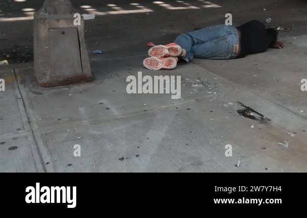 Homeless person passed out Stock Videos & Footage - HD and 4K Video ...