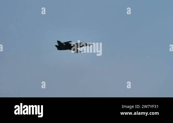 Modern combat light jet aircraft does an high performance turn in ...