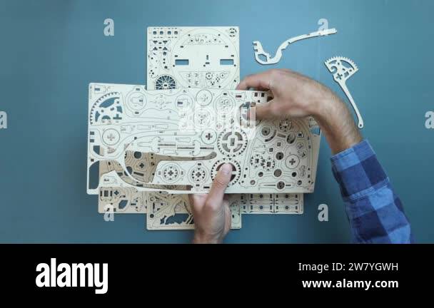 Hands assembling wooden toy Stock Videos & Footage - HD and 4K Video ...