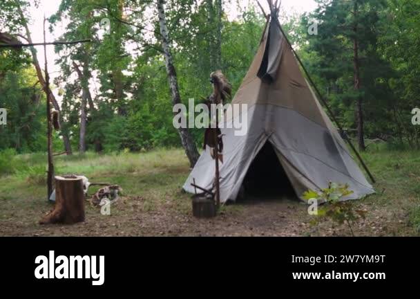 Forest home of the Indians. Wigwam indian teepee. The life of nomadic ...