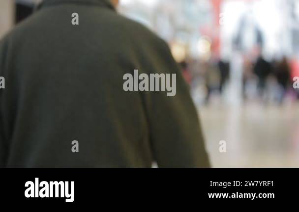 Blur background of shopping mall and crowd of walking people in the ...