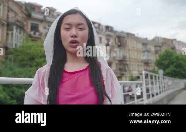 Asian lady TV presenter announcing weather forecast, blogger recording ...