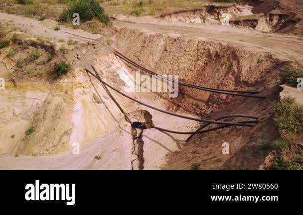 Protruding sewer pipes from the ground. An accident in the city ...