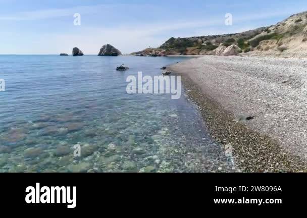 Beautiful Mediterranean sea beach with pebbles. Vacation and relax in a ...