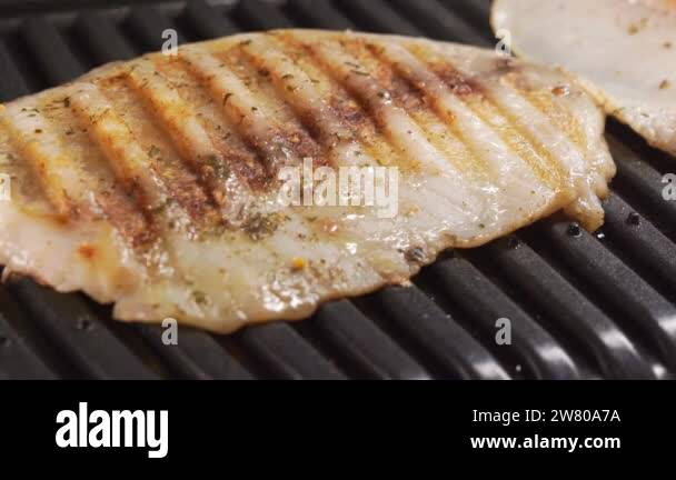 Tilapia fish cooked Stock Videos & Footage - HD and 4K Video Clips - Alamy