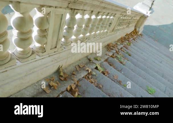 Stone stairs with big cement steps and marble column railing Stock ...