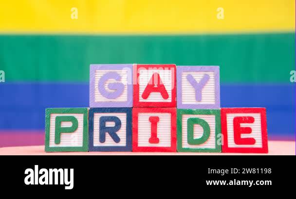 Animation of gay pride on blocks and female and male symbols on rainbow ...