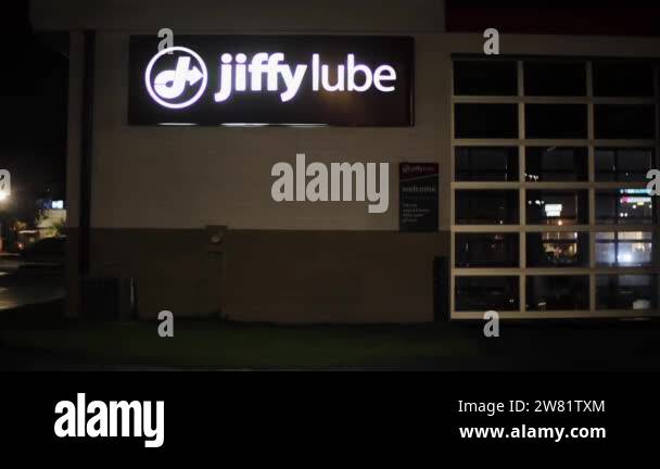 Augusta, Ga USA - 10 10 21: Jiffy Lube oil change retail store at night ...