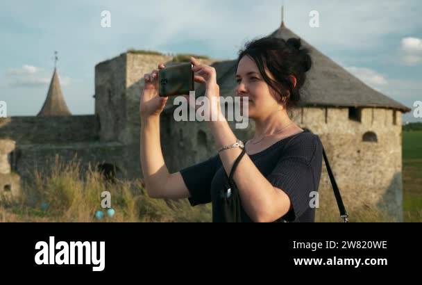 Female Tourist Takes Pictures Photo Shoots on Smartphone of Old ...
