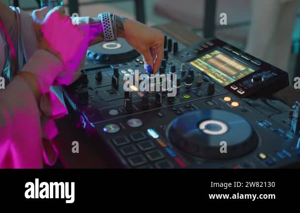 Close up. DJ sound control console for mixing dance music in disco club ...