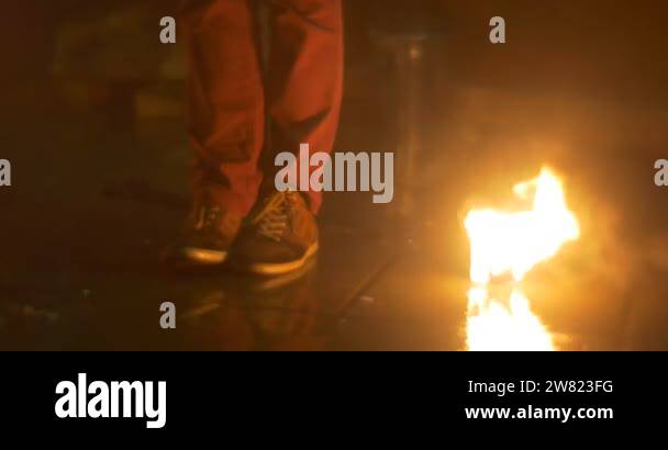 Legs of Some Person Dancer is Walking Along Fire Torch Dance Troupe is ...