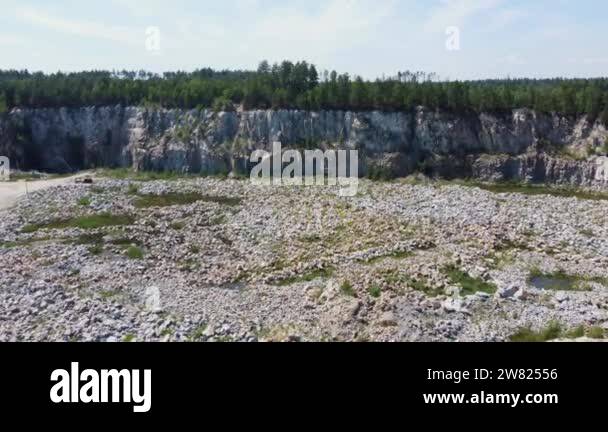 Operating quarry for the extraction of gray granite located among the ...