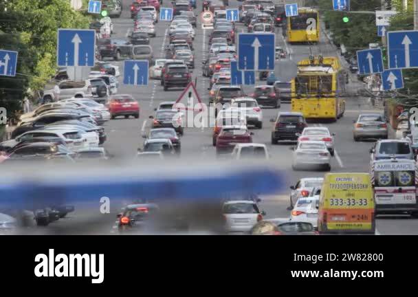 Flashing light sirene police car street traffic in big city background ...