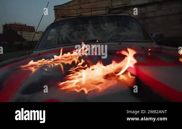 Close look on maliciously wrecked during street violent riot cars burn ...